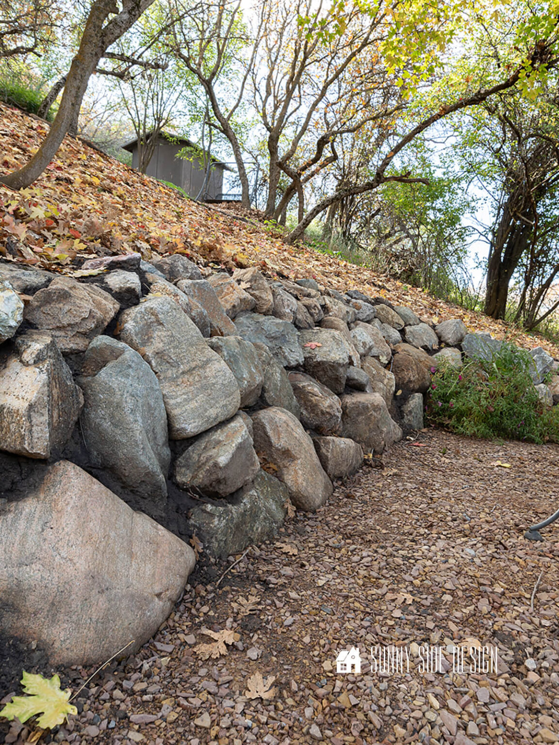 How to Build a Simple Stone Retaining Wall for Free | Sunnyside Home
